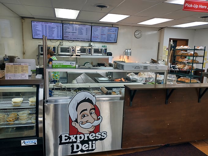 Behind this counter, dreams come true. The mustachioed logo isn't just cute—it's a promise of old-world dedication to deli perfection.