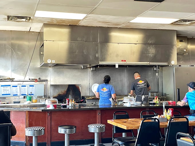 Where the magic happens – Fitzy's open kitchen lets you witness the breakfast ballet that transforms simple ingredients into morning masterpieces.