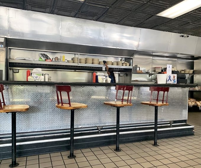 Counter seats: where solo diners become breakfast philosophers and the short-order cook might just become your morning therapist.