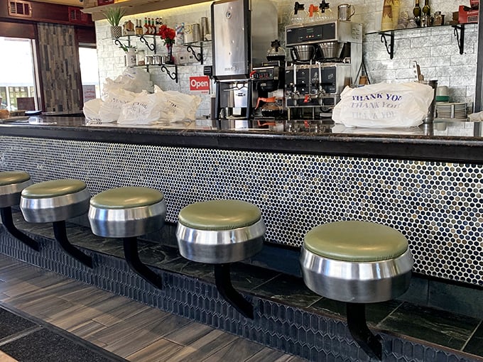 The counter seats – where solo diners become regulars, servers become friends, and breakfast becomes a social event rather than just a meal.