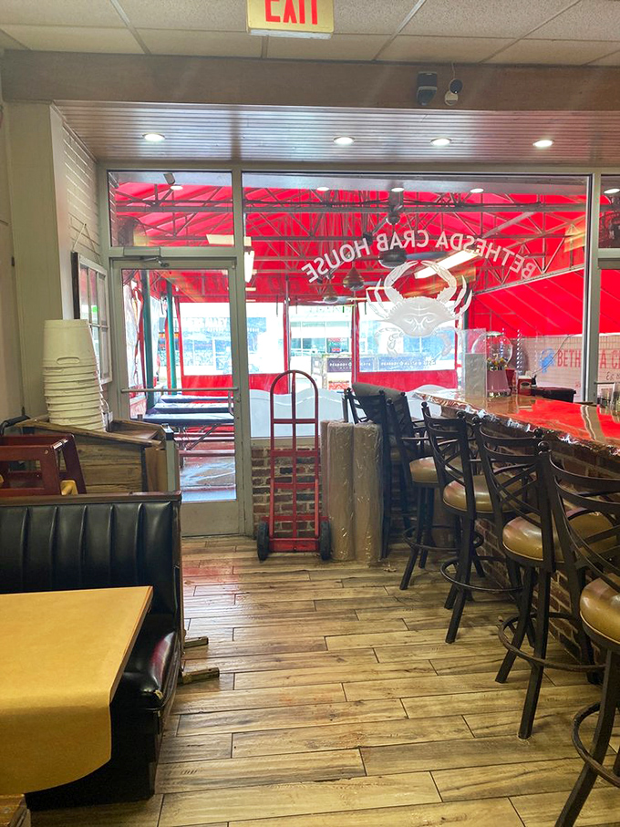 Looking through to the iconic red awning from inside—this view has welcomed countless crab enthusiasts seeking Maryland's authentic seafood experience.