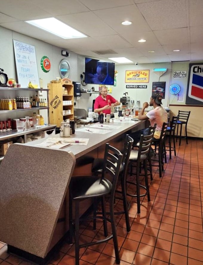 The counter seating – where solo diners become regulars and the staff remembers your order before you've fully settled onto your stool.