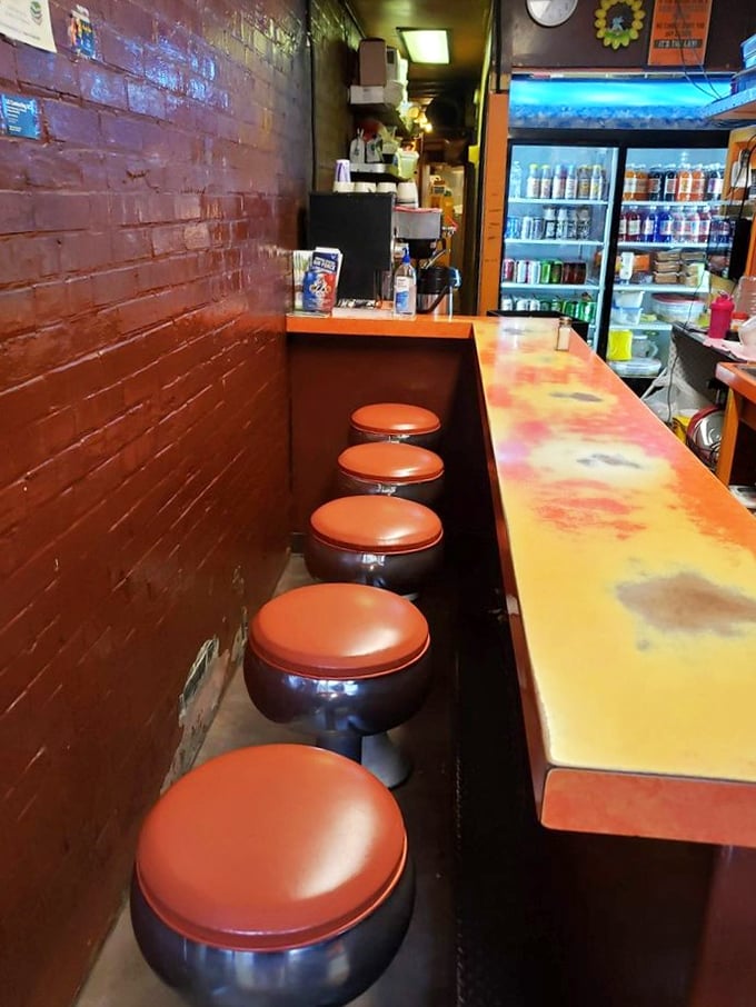 Six stools, one counter, infinite memories. The Squeeze-In proves greatness doesn't require square footage.