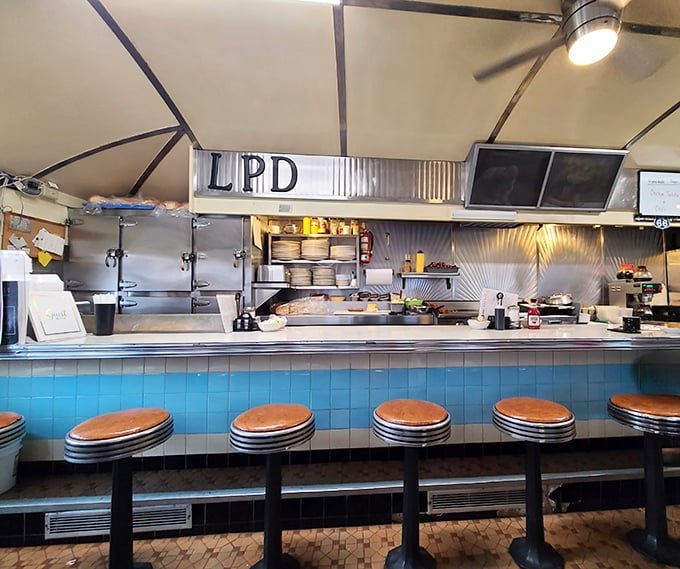 The blue-tiled counter hasn't changed in decades – proof that some designs, like comfort food itself, simply cannot be improved upon.