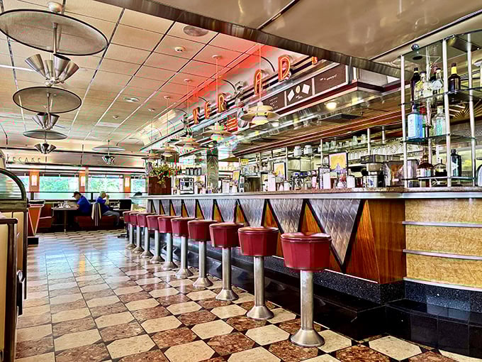 Counter seats where coffee cups never empty and conversations flow as freely as the maple syrup.