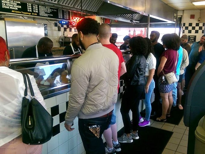 The line forms for a reason. These people aren't waiting for concert tickets – they're queuing for something better: sandwich immortality.