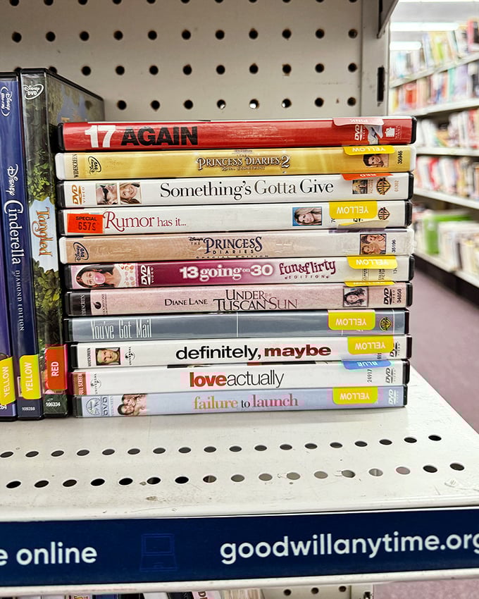 A stack of rom-com DVDs proves "Love Actually" is all around us—especially in the media section where "Definitely, Maybe" you'll find your next movie night selection.
