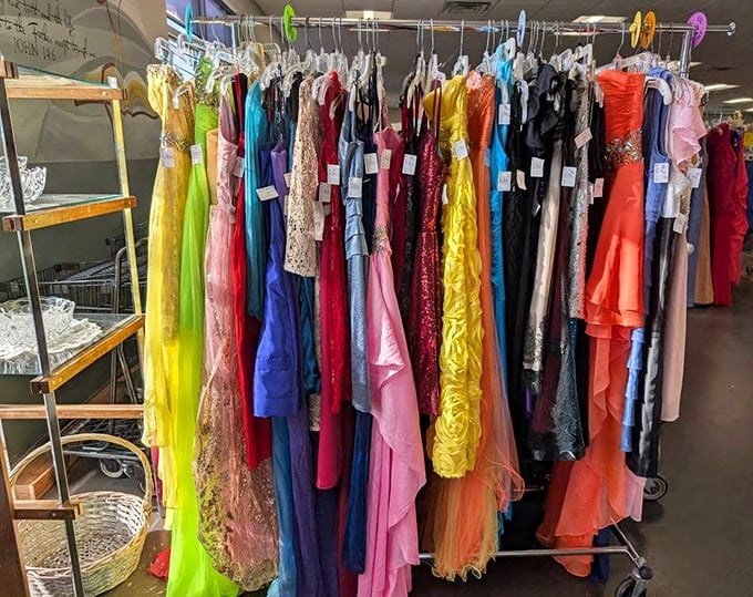 A rainbow explosion of prom and party dresses—from subtle sequins to full-on glitter bombs—all waiting for their next night to shine.