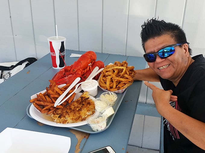 The seafood feast that launched a thousand food dreams. That lobster isn't just dinner – it's a red-shelled celebrity posing for its delicious close-up.