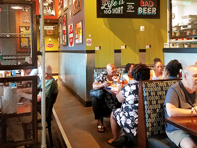 A diverse crowd united by the universal language of "wow, this is good"—the United Nations of burger appreciation.