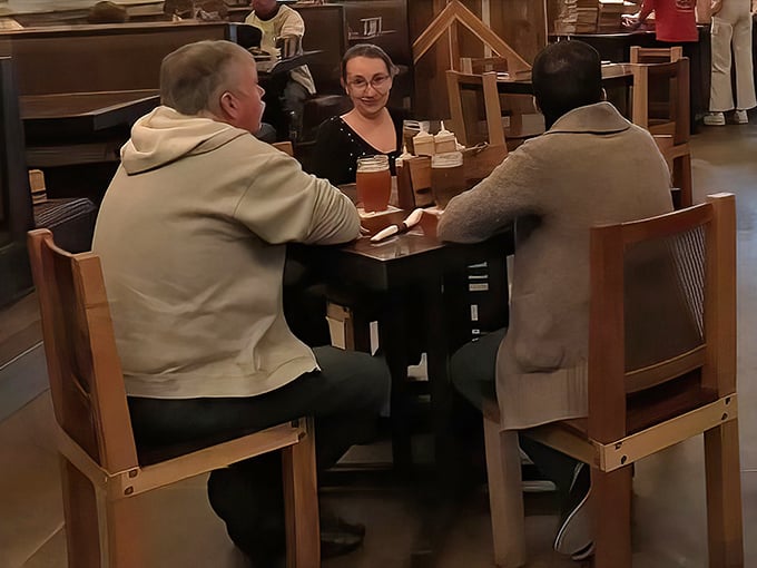 The universal language of barbecue bringing people together. Notice the absence of conversation—the food is doing all the talking.
