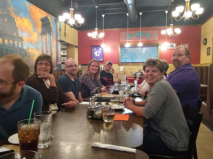 Happy diners proving that the universal language isn't love – it's a table full of Italian comfort food.