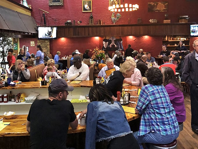 A full house at Josie's—where strangers become temporary breakfast companions united by the universal language of "pass the hot sauce, please."