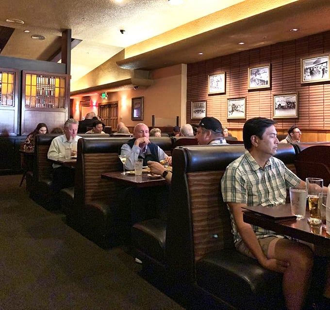 Every booth tells a story – of business deals sealed, anniversaries celebrated, and the simple joy of breaking bread with those who matter.