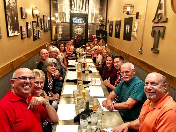 A full table celebrating together proves great food creates community—the real secret ingredient in any successful restaurant.