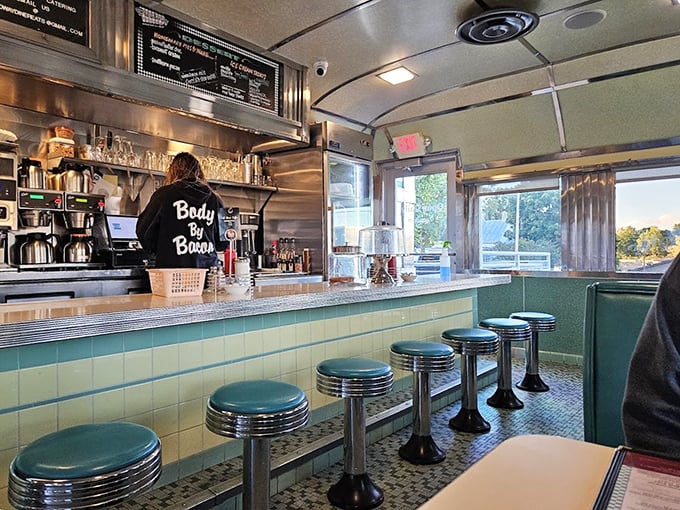The counter is where the magic happens—where coffee cups are never empty and conversations with strangers become the highlight of your day.