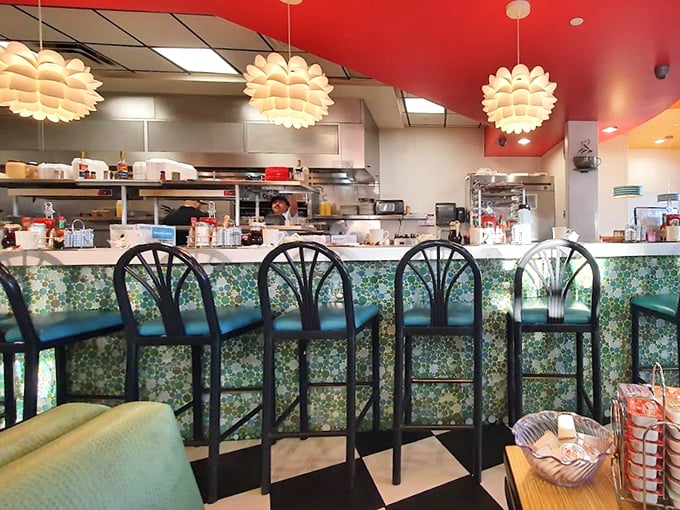 The counter seating offers front-row tickets to the breakfast show—where skilled cooks perform culinary magic without smoke or mirrors.