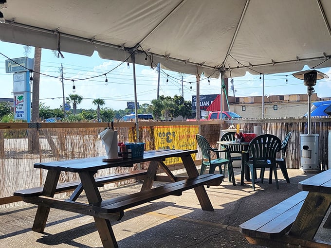 The outdoor dining area – where salty breezes enhance every bite. Those string lights aren't just decoration; they're setting the stage for seafood memories.