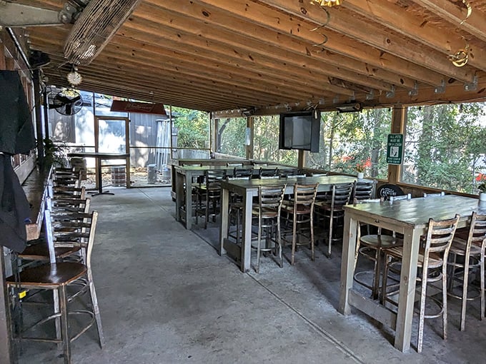 Outdoor seating where the breeze carries hints of hickory smoke. Nature and barbecue—a pairing as old as fire itself.