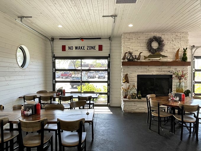 The "No Wake Zone" dining area combines nautical charm with lakeside comfort. A place where time slows down and appetites rev up.