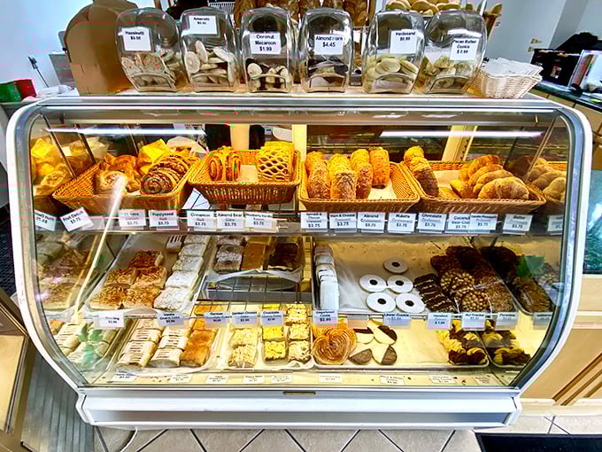 A pastry case that should come with a warning label: "May cause spontaneous joy and the urge to buy everything."