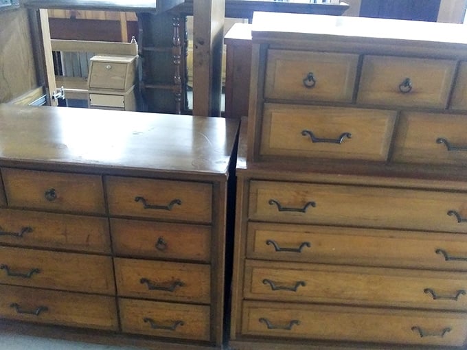 Solid wood dressers stand like sentinels of quality craftsmanship. They don't make 'em like this anymore—unless "they" are at Community Thrift.