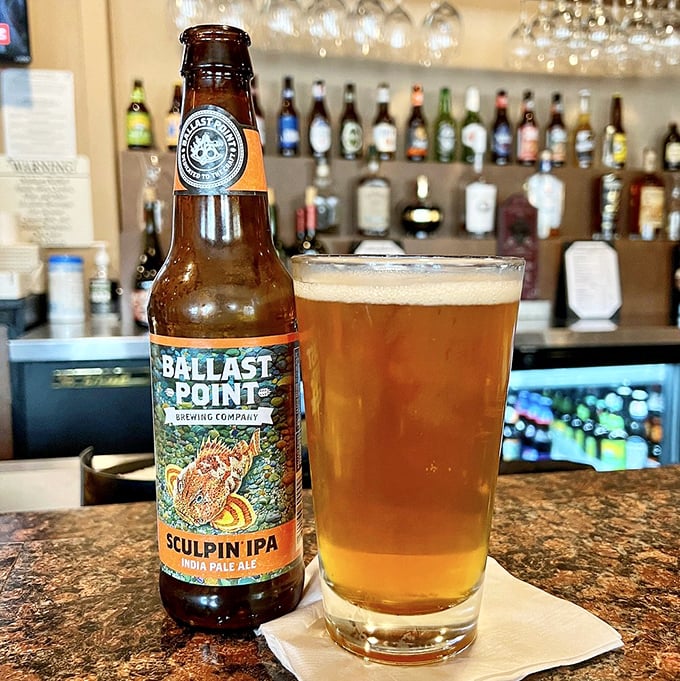 A properly poured Ballast Point Sculpin IPA—because great food deserves equally great beer. California craft brewing at its refreshing best.