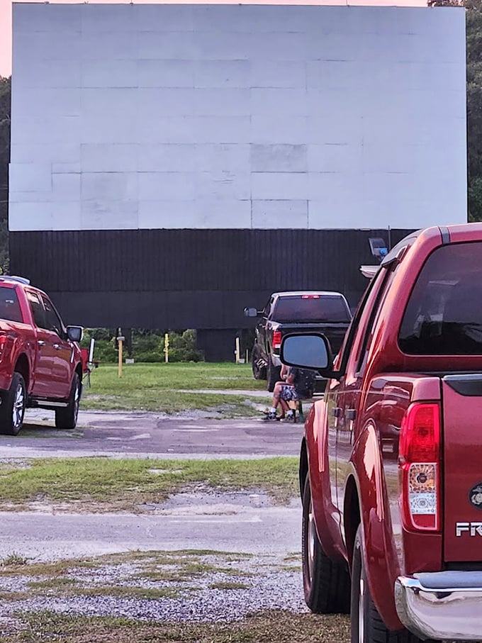 Trucks line up for the perfect viewing spot—tailgates down, blankets ready, and no one complaining about legroom.