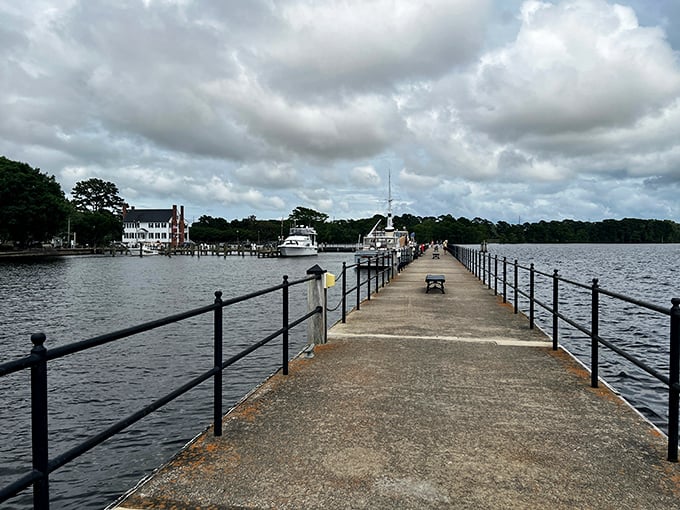 Edenton's harbor walkway stretches toward adventure like a runway for daydreams. The perfect spot for contemplating life or lunch—preferably both.
