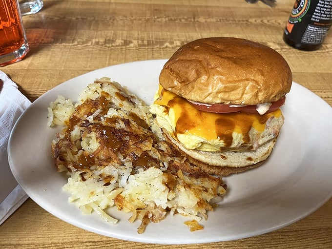 A breakfast sandwich that understands the importance of proper architecture—egg, cheese, and protein in perfect harmony.