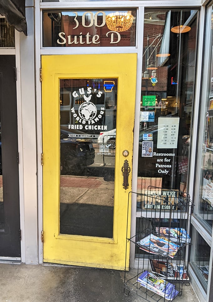 The yellow door stands like a portal to another dimension—one where calories don't count and chicken is always perfectly fried. Enter at your own delicious risk.