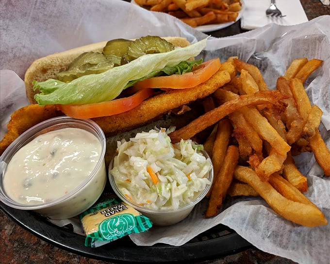 A fish sandwich that doesn't need fancy aioli or microgreens to impress—just honest cooking and sides that remind you what fries should taste like.