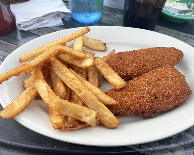 Sometimes simplicity speaks volumes—crispy fish fillets alongside hand-cut fries create the kind of straightforward pleasure that needs no explanation, just appreciation.