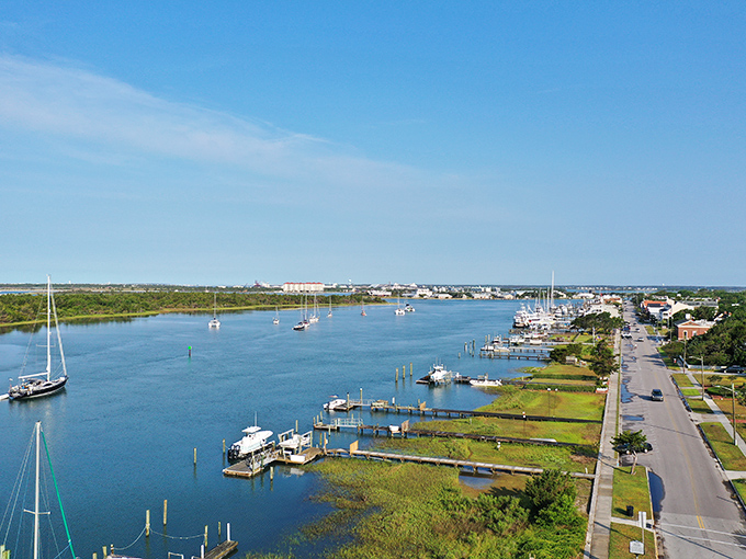 Beaufort's waterfront promenade offers a front-row seat to maritime ballet, where sailboats and fishing vessels perform daily.
