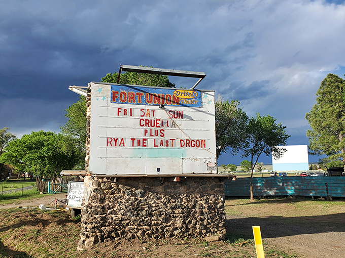 The Fort Union Drive-In's vintage marquee advertises current films, proving that some retro experiences improve with age—just like their audience.