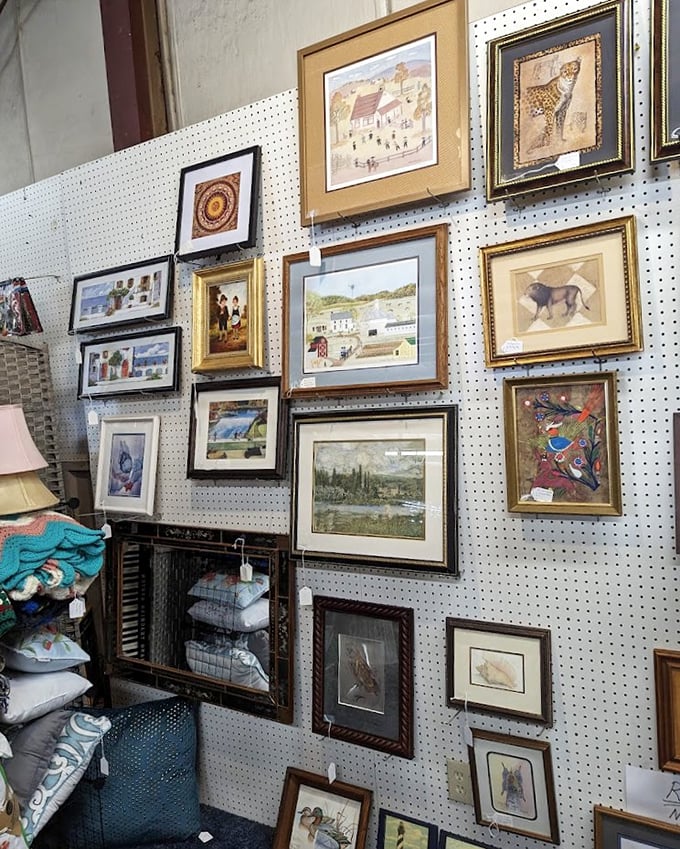 A gallery wall waiting to happen! These framed pieces range from folk art to landscapes, each telling a different story of artistic expression.