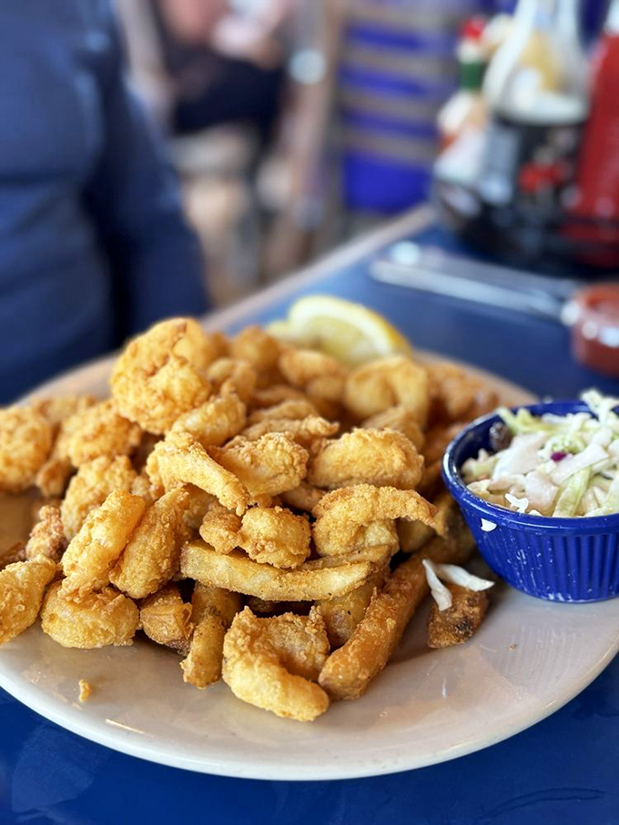 The fried clam plate that launched a thousand road trips—golden, crispy morsels that taste like summer vacation in New England.