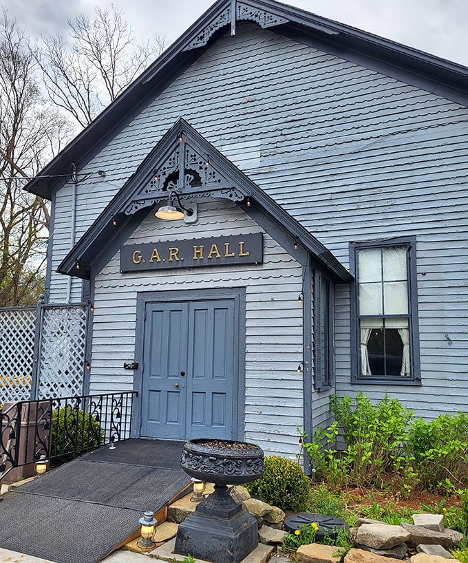 The G.A.R. Hall's weathered blue exterior belies the vibrant music and history contained within – a perfect metaphor for Peninsula's unassuming charm.
