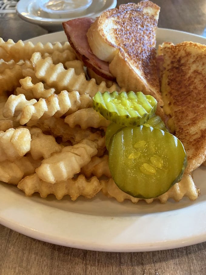 The grilled ham and cheese sandwich—proof that simplicity, when executed perfectly, can outshine even the most complicated culinary creations.