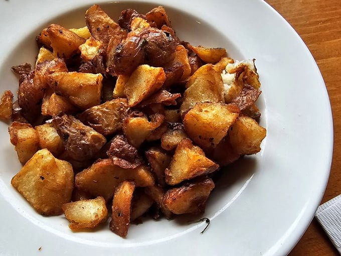 These aren't just potatoes—they're little golden nuggets of happiness. Crispy edges, fluffy centers, and seasoning that makes ordinary home fries weep with jealousy.