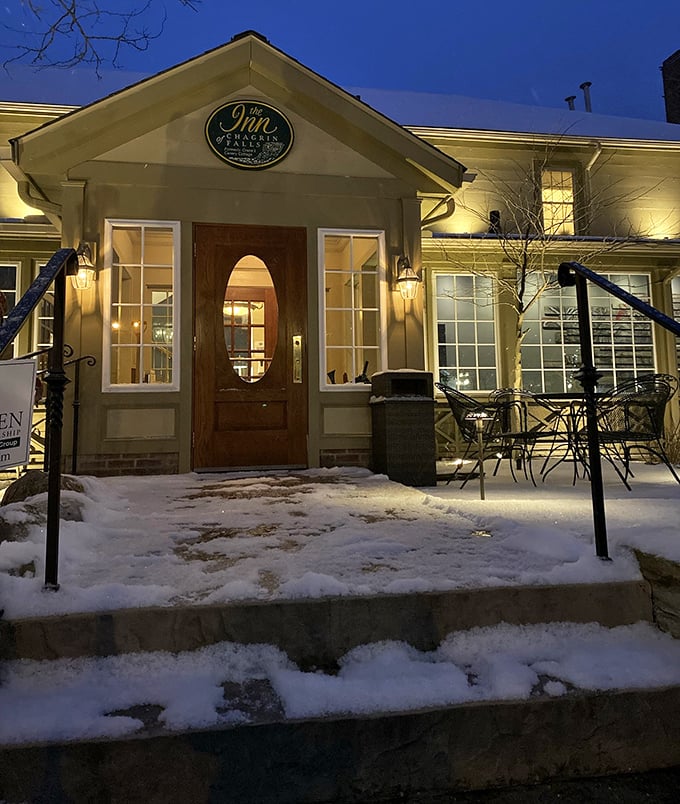 The Inn of Chagrin Falls glows with winter welcome, proving that snowfall only enhances the village's storybook appeal.