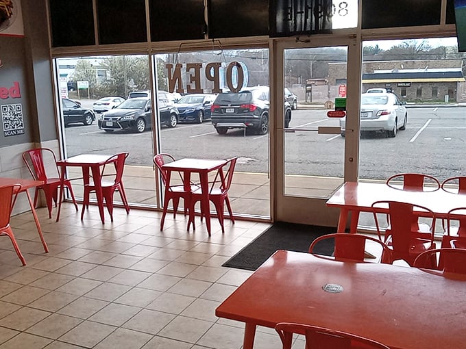 Those red tables and chairs aren't just furniture—they're front-row seats to one of Virginia's greatest culinary performances.