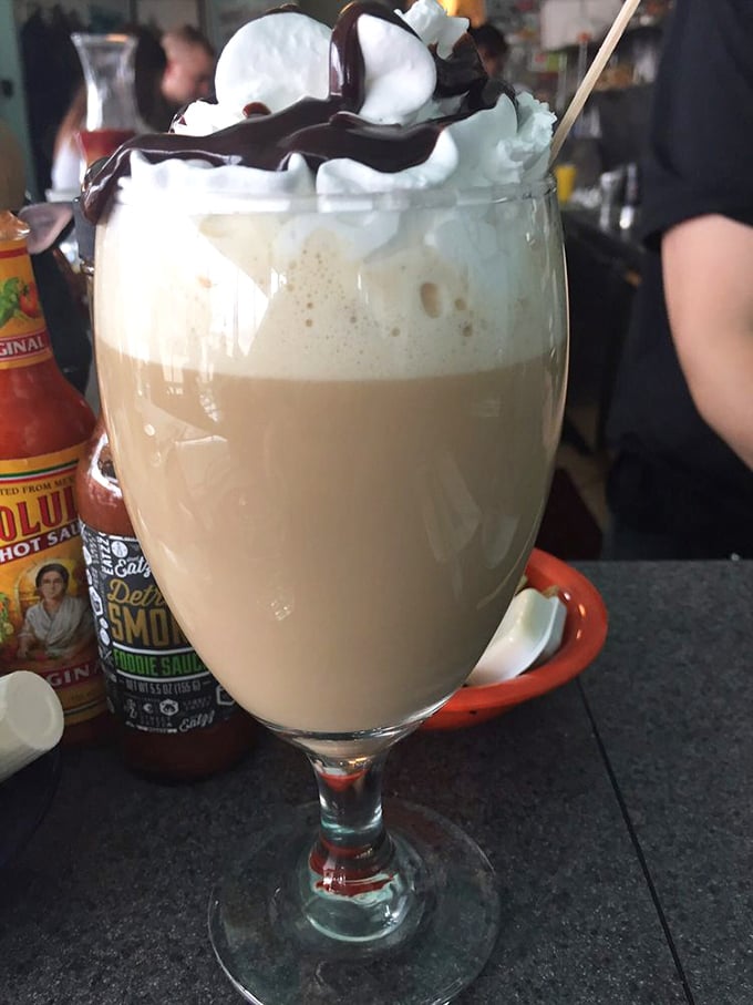 This isn't just a coffee drink—it's dessert with an employment history, topped with enough whipped cream to make your dentist buy a vacation home.