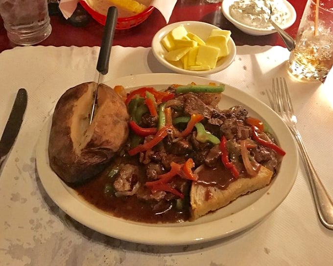 Jack's Stack isn't just dinner; it's a meaty monument to excess done right—sautéed steak medley over garlic bread that demands to be photographed.