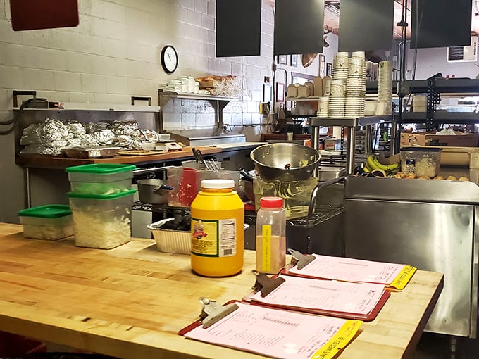 Behind the scenes where barbecue dreams come true. Those containers and prep areas aren't just organized—they're ready for delicious battle.