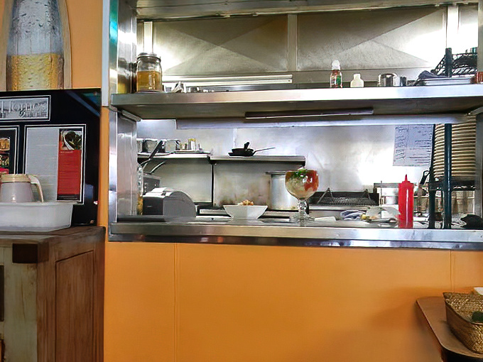 That kitchen pass-through where all the magic happens before landing on your table—the backstage of deliciousness, basically speaking.