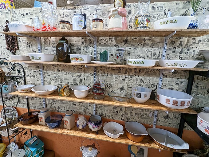 Vintage Pyrex and Corningware fill shelves, proving your grandmother's kitchen choices were both stylish and surprisingly collectible today.