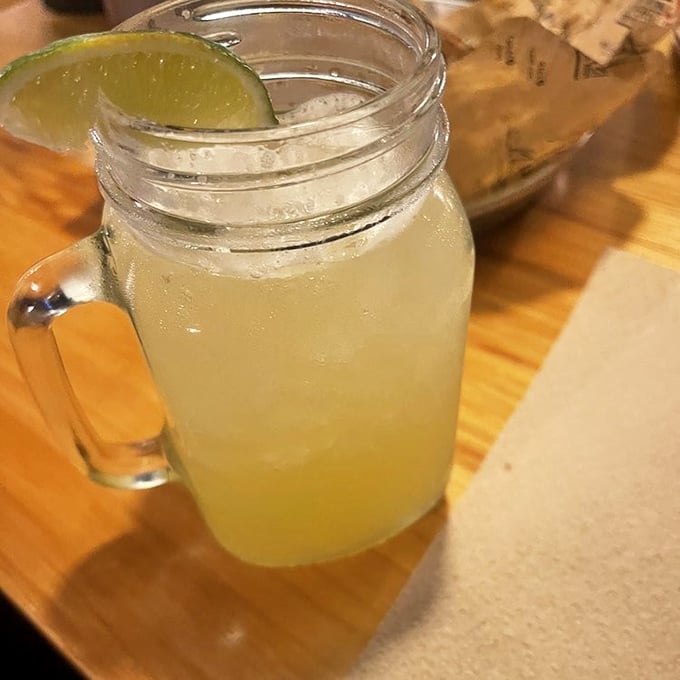 A mason jar margarita with a lime wedge perched on the rim—Florida's answer to "What pairs with everything on the menu?"