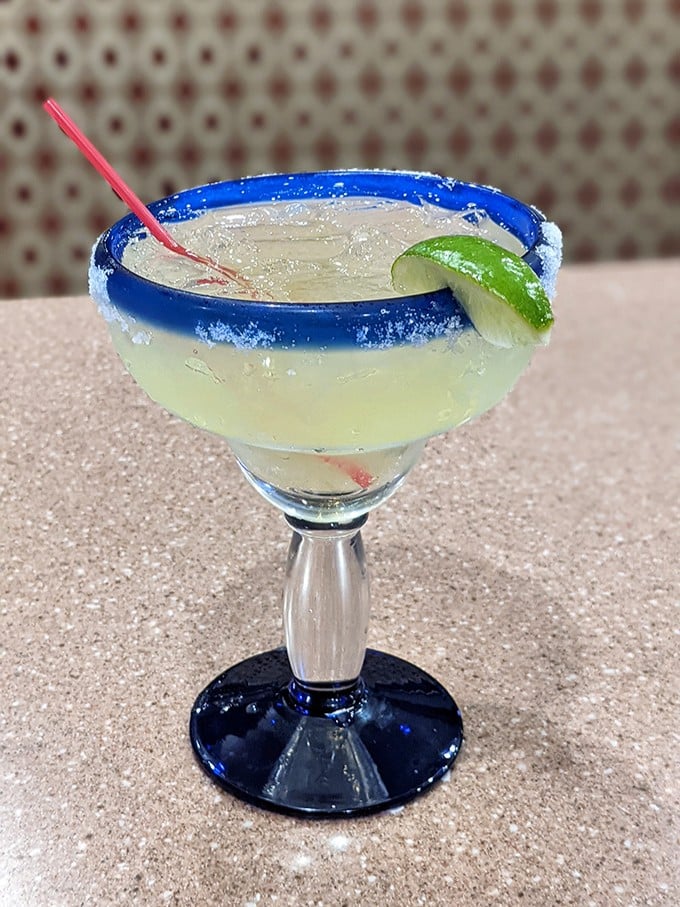 The blue-rimmed margarita that says "Yes, diners can make excellent cocktails too." That salt rim is calling your name, even at 11am.