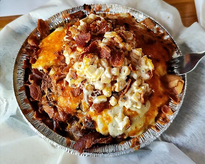 This mac and cheese, crowned with bacon, isn't just comfort food—it's therapy in a tin. Each bite is a creamy, smoky revelation.